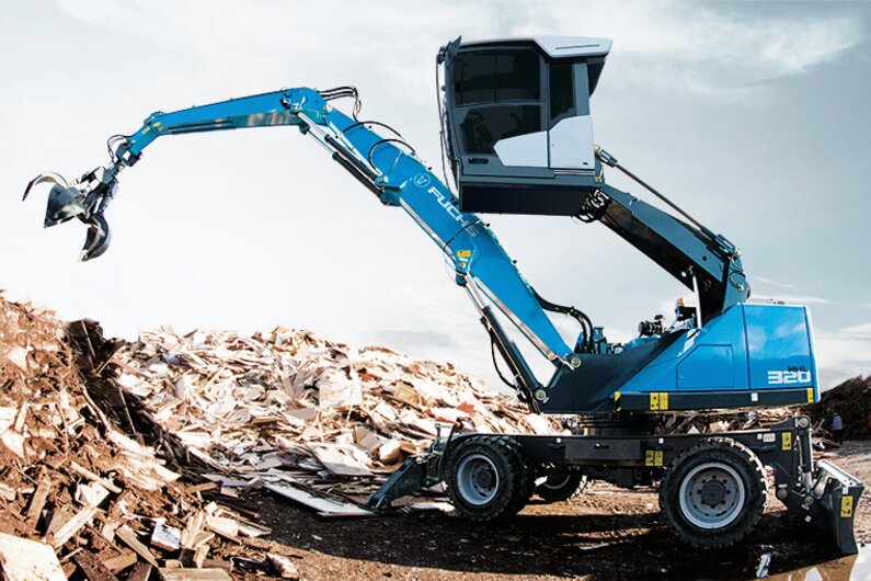 Der Fuchs MHL320F Umschlagbagger